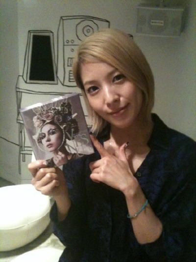 BoA poses with her new album | allkpop