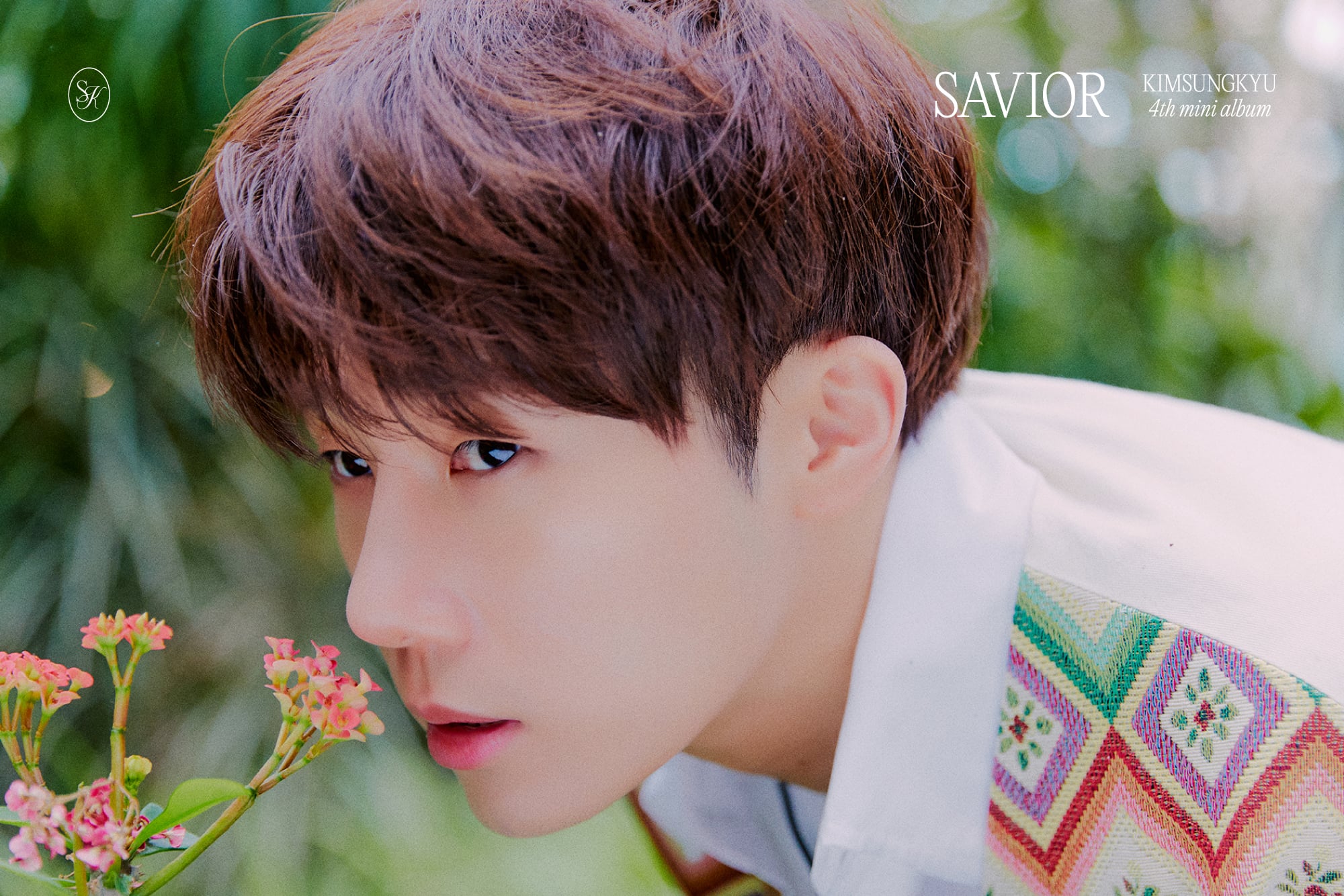 Kim Sung Kyu takes a whiff of spring in the new teaser photo for his ...