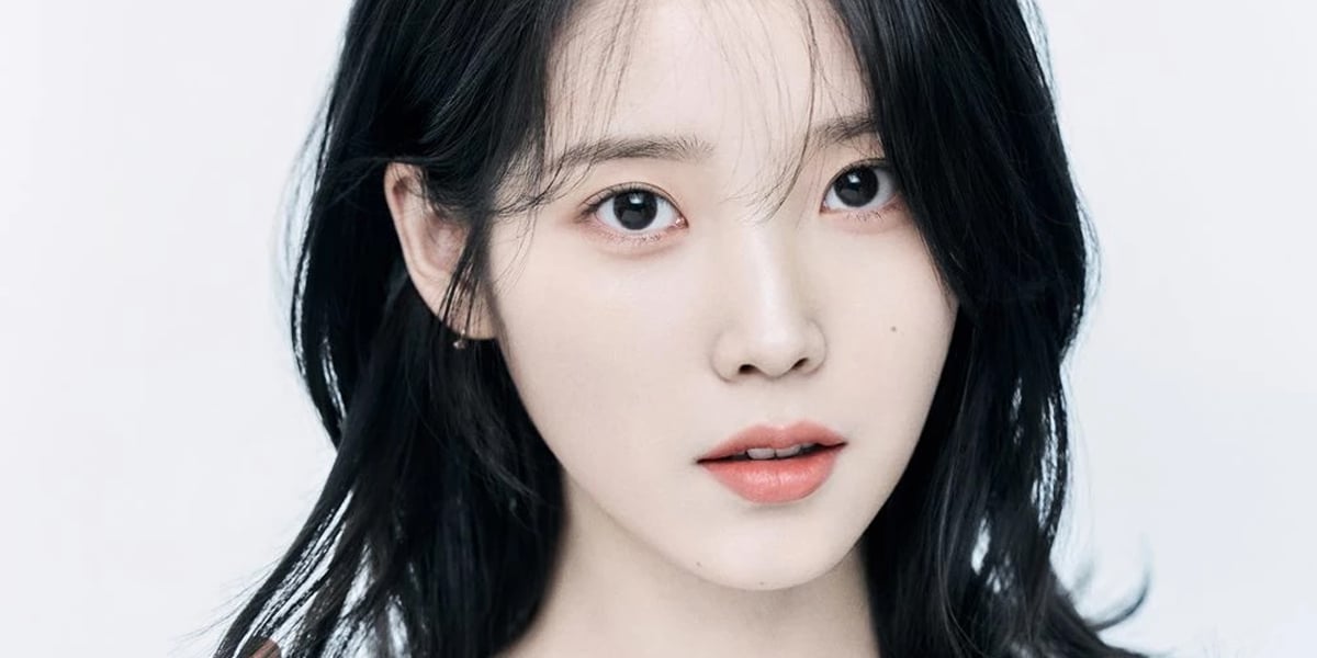 IU offered female lead role in new drama by 'When The Camellias Bloom ...