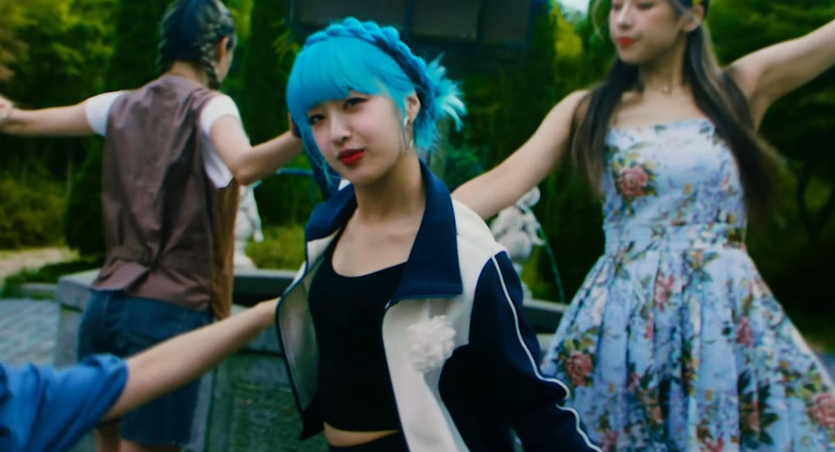 ADORA strikes up the band in MV for 'Magical Symphony' | allkpop