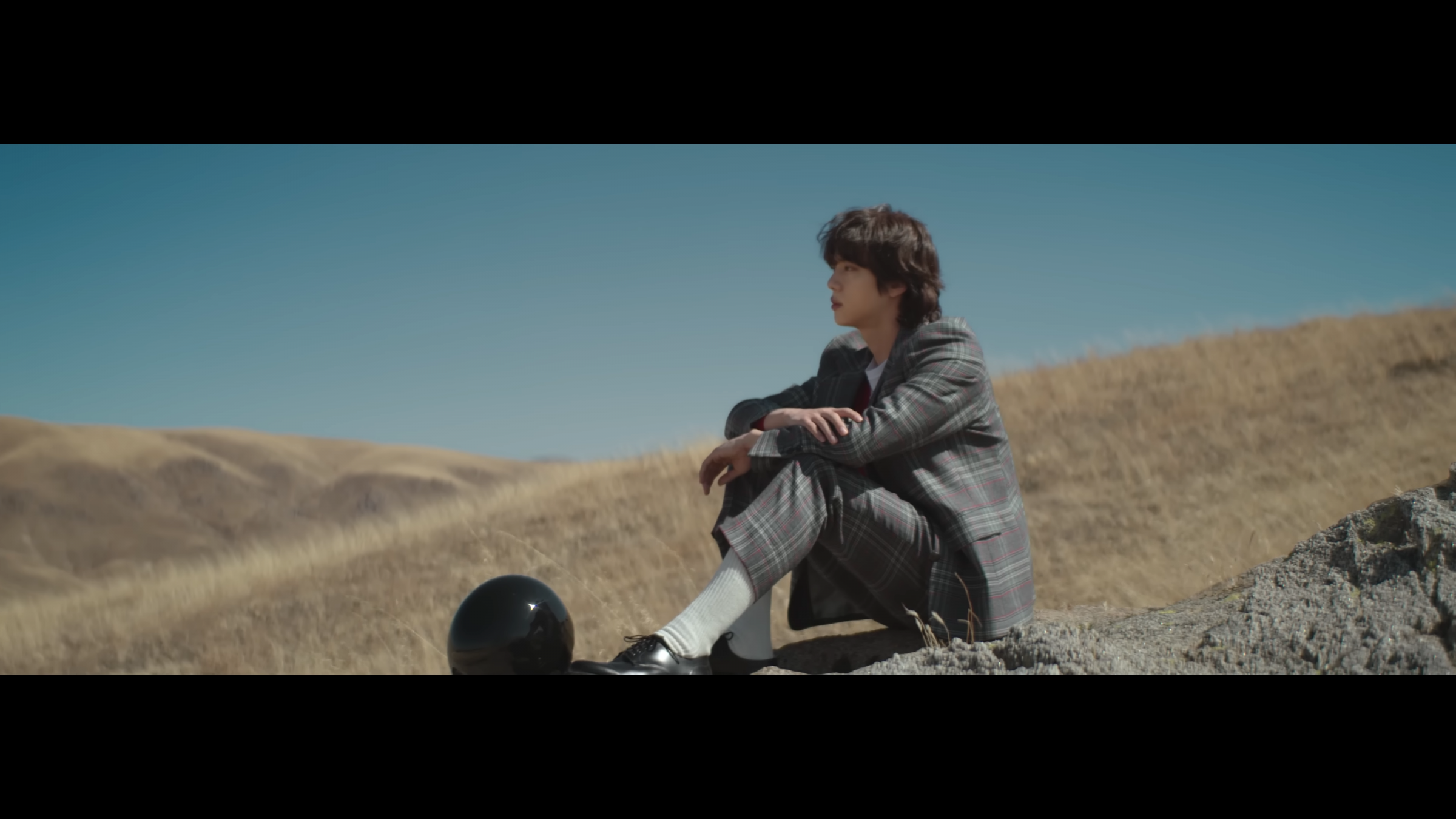 BTS's Jin crashes onto a barren land on earth in the video teaser for 'The Astronaut' | allkpop