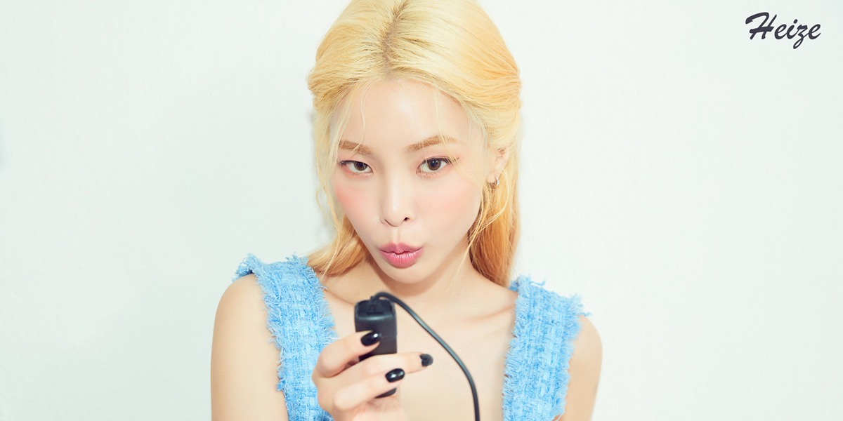 Heize sustains a torn ligament + minor fracture in her left knee | allkpop