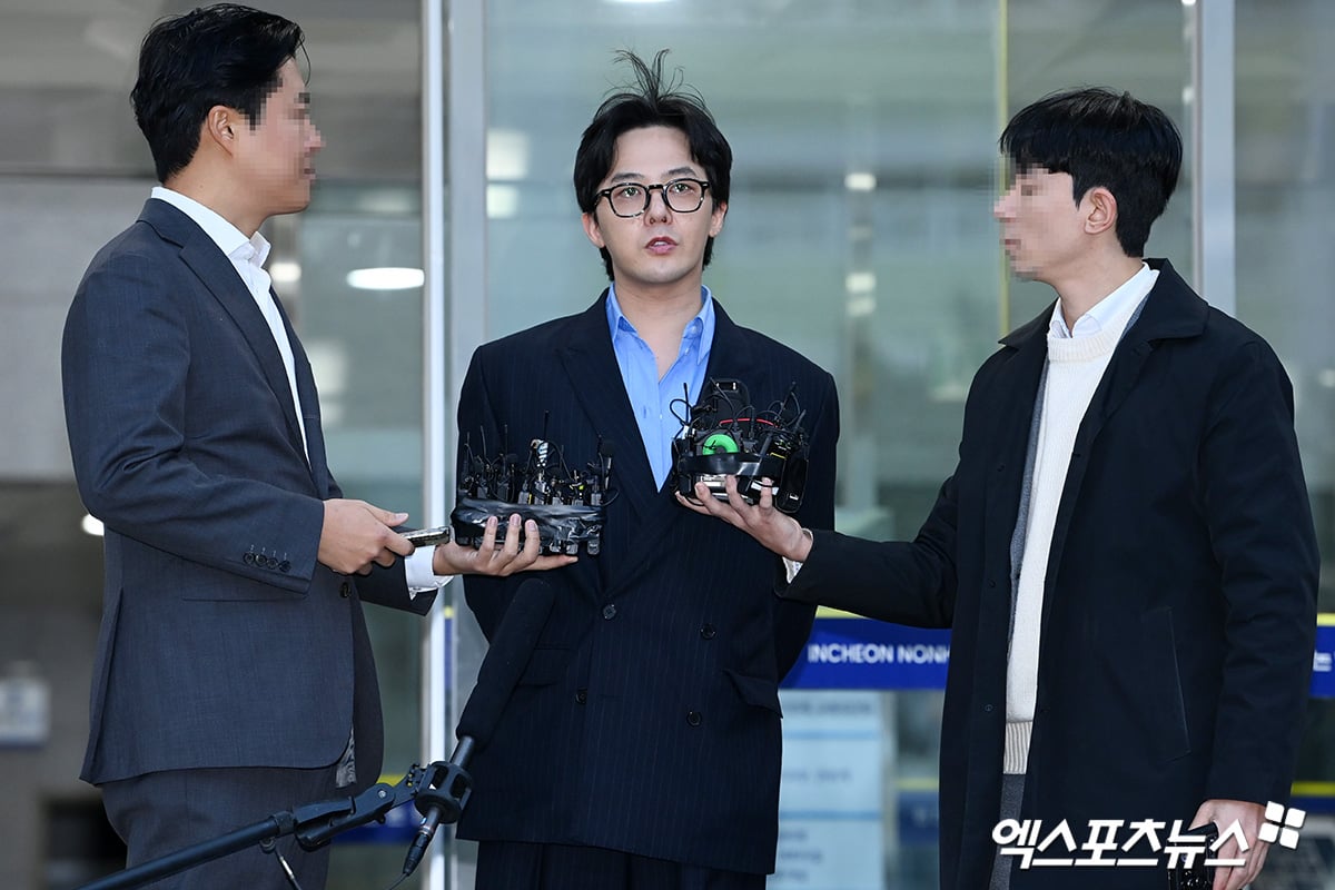 G-Dragon returns home after 4 hours of investigation and clearing a ...