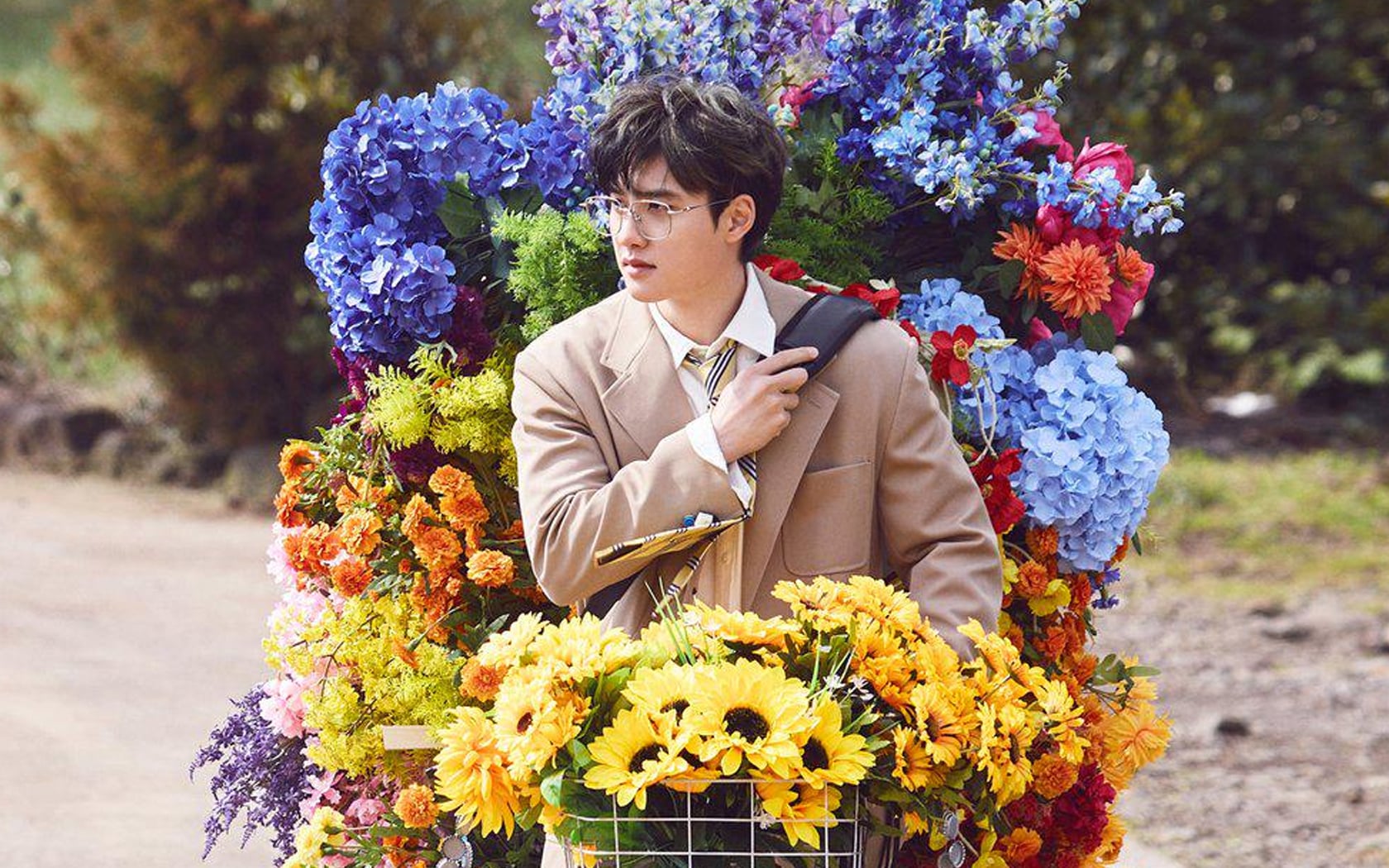 EXO's D.O. delivers beautiful flowers in the new concept photo for his upcoming 3rd mini-album ...