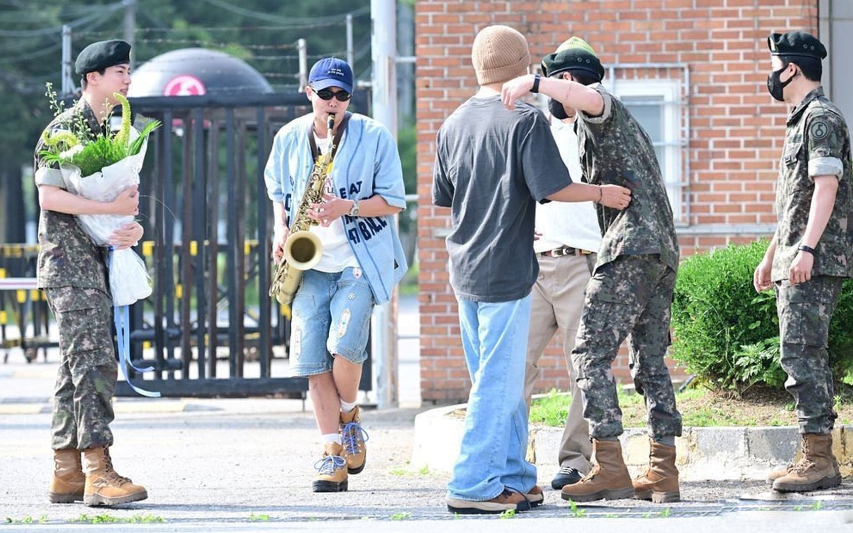 BTS's Jin says he didn't realize RM was playing the saxophone next to ...