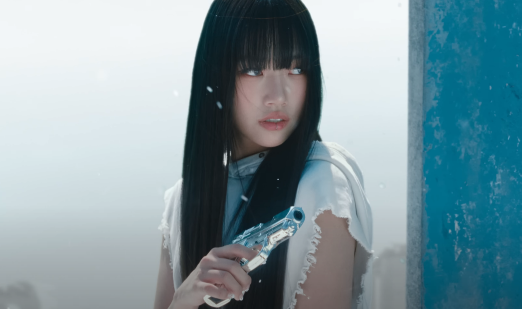 Watch MEOVV’s Sooin win a gun fight in the snow before showcasing dance moves | allkpop