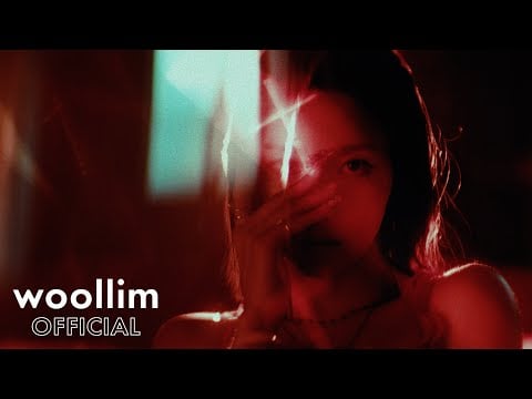 Kwon Eun Bi reveals alluring energy in new 'Hello Stranger' MV | allkpop