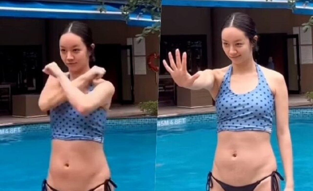 Hyeri draws attention for her bold swimwear and playful poolside pose | allkpop
