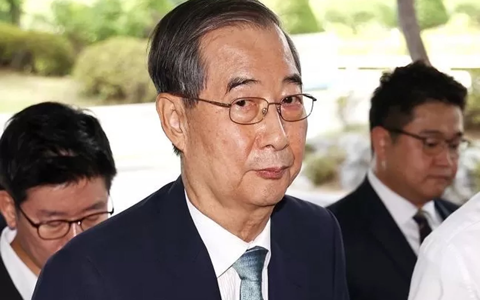 Former Prime Minister Han Duk Soo sentenced to 23 years for treason ...